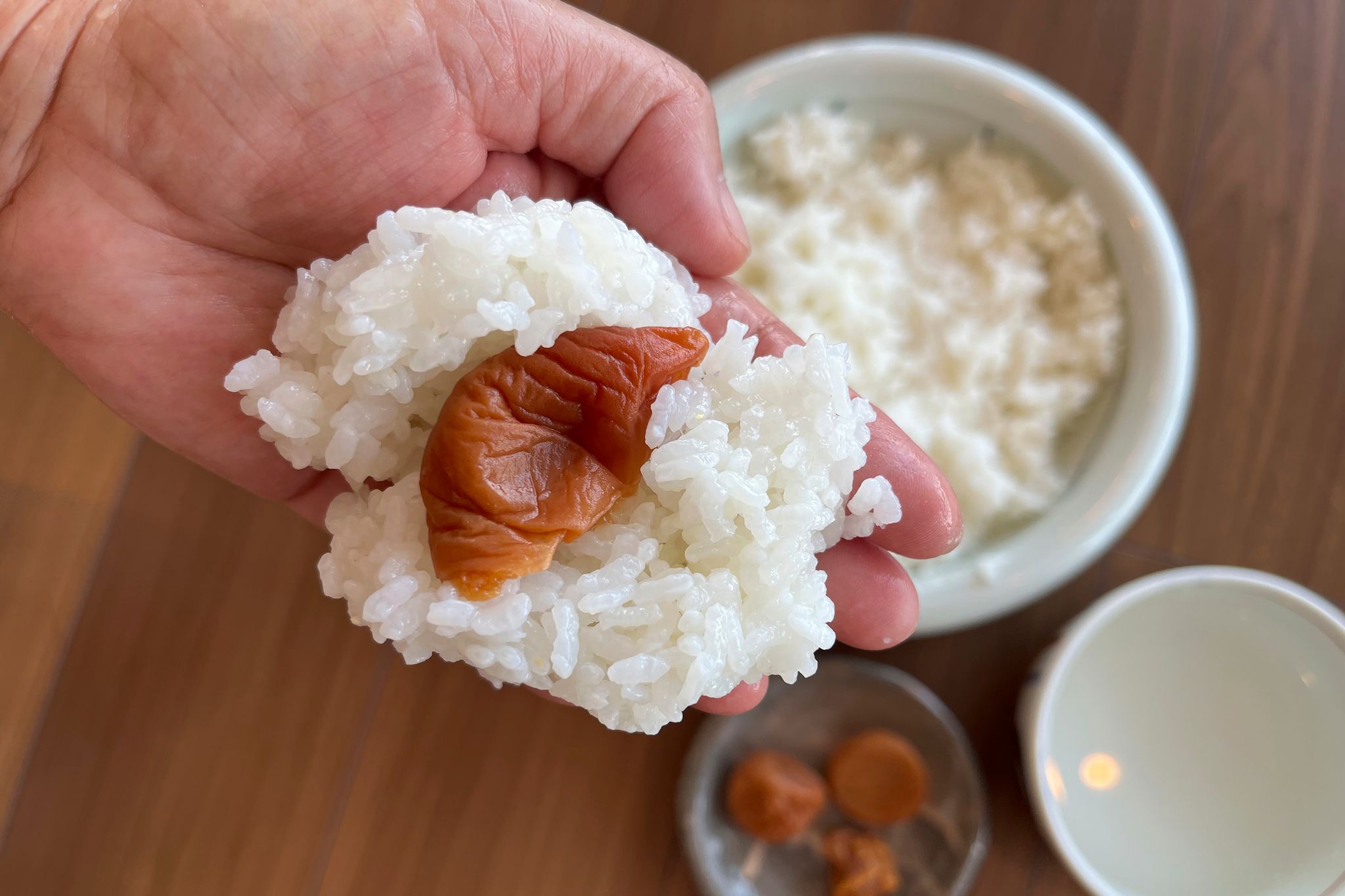 A simple recipe for onigiri, or Japanese rice balls, with salted plums ...