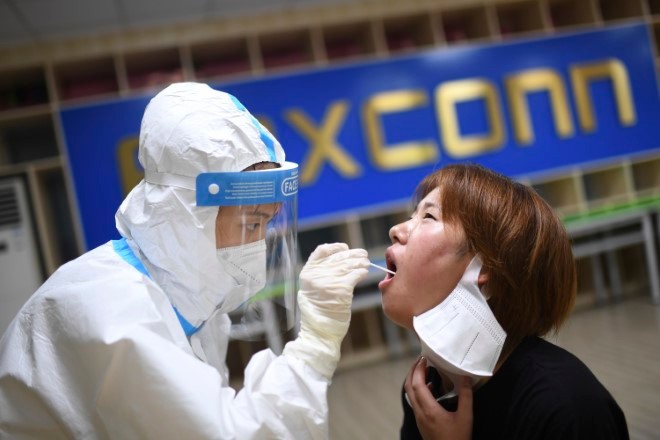 Foxconn to ease COVID-19 curbs in Chinese iPhone factory | The Asahi ...