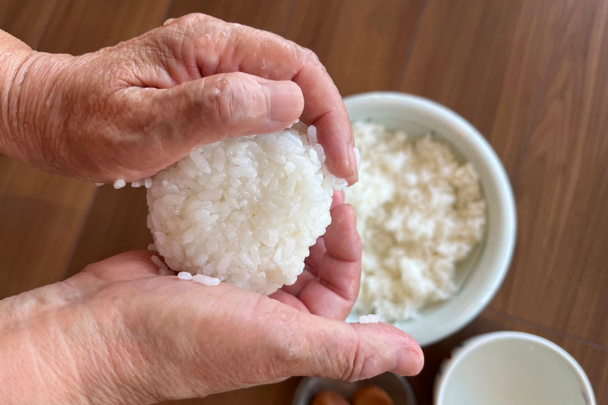 A simple recipe for onigiri, or Japanese rice balls, with salted plums ...
