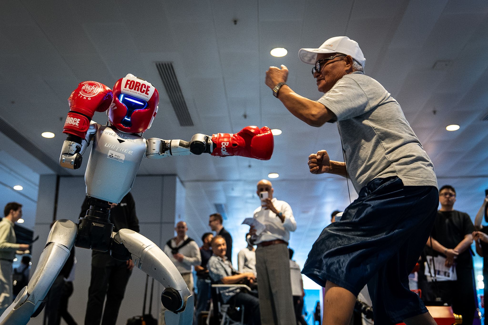 Humanoid robots show off their language and boxing skills in Hong Kong ...