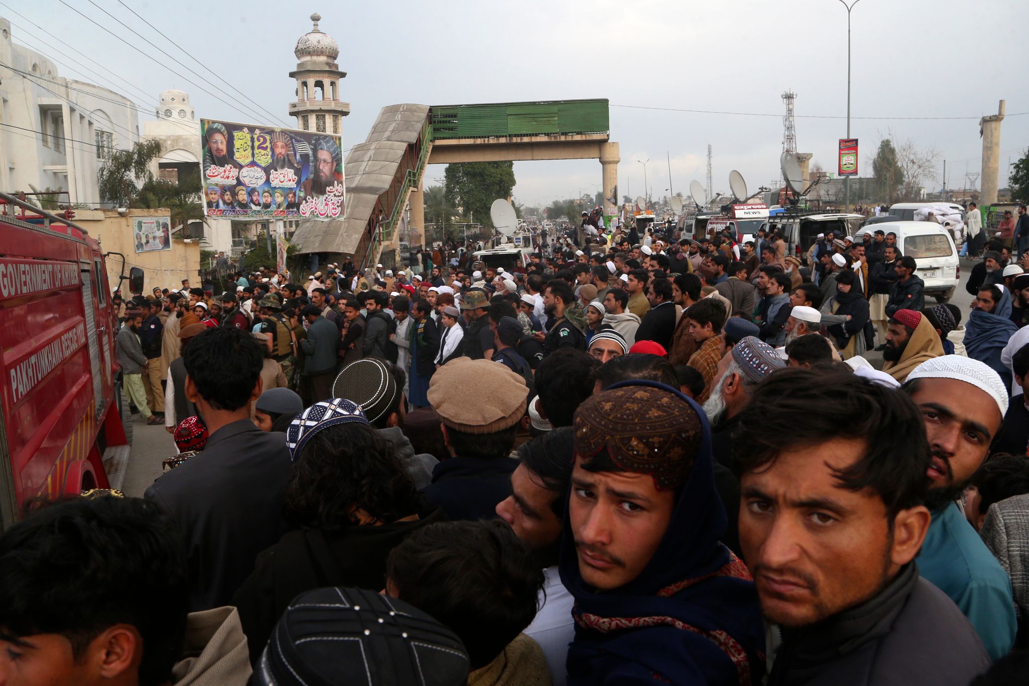 Thousands of mourners attend funeral of Taliban-linked cleric killed in ...