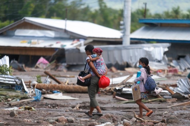 Nearly 100 dead, dozens missing in storm-ravaged Philippines | The ...