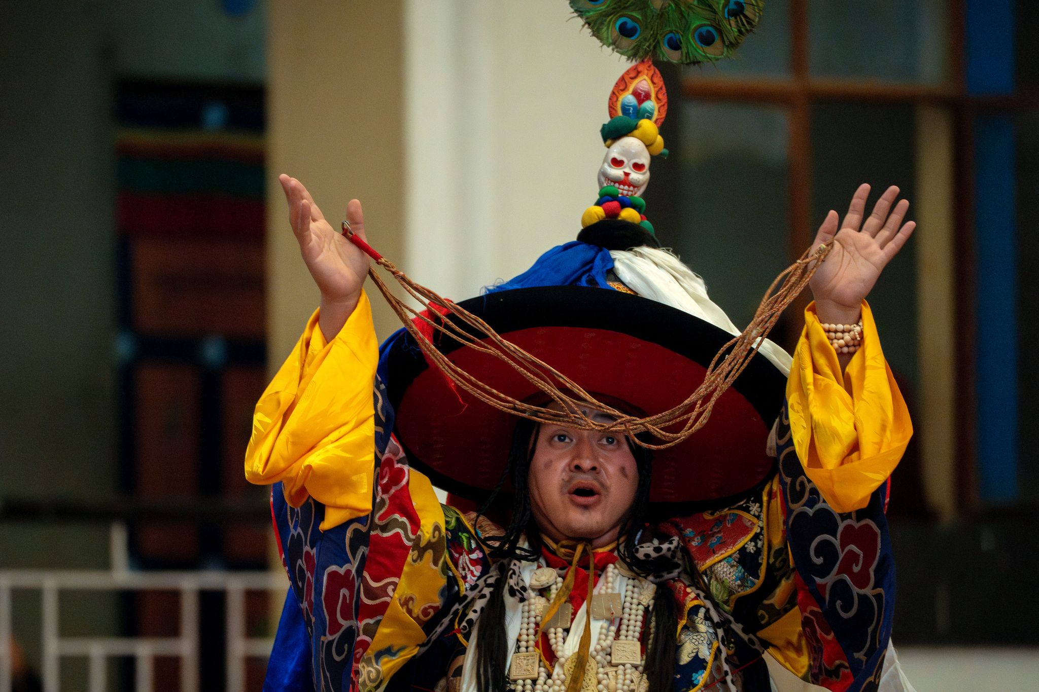 Wrathful deities are invoked in a Tibetan Buddhist dance in a monastery ...